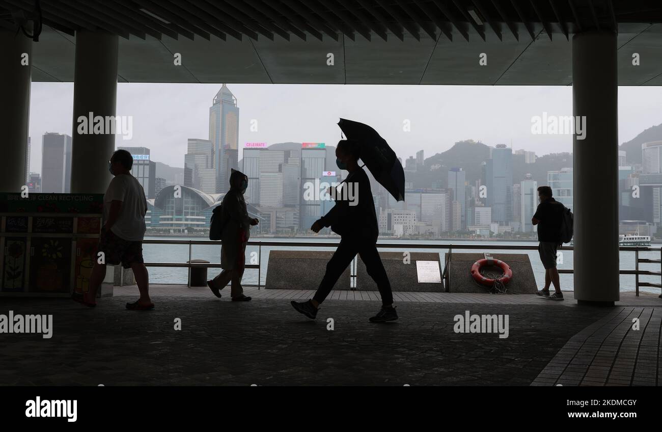People at Tsim Sha Tsui under typhoon signal No 3 as Tropical Storm ...