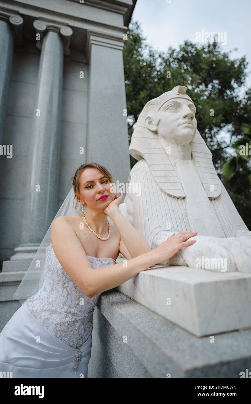 Bride with Attitude Standing in Front of a Granite Building Stock Photo ...