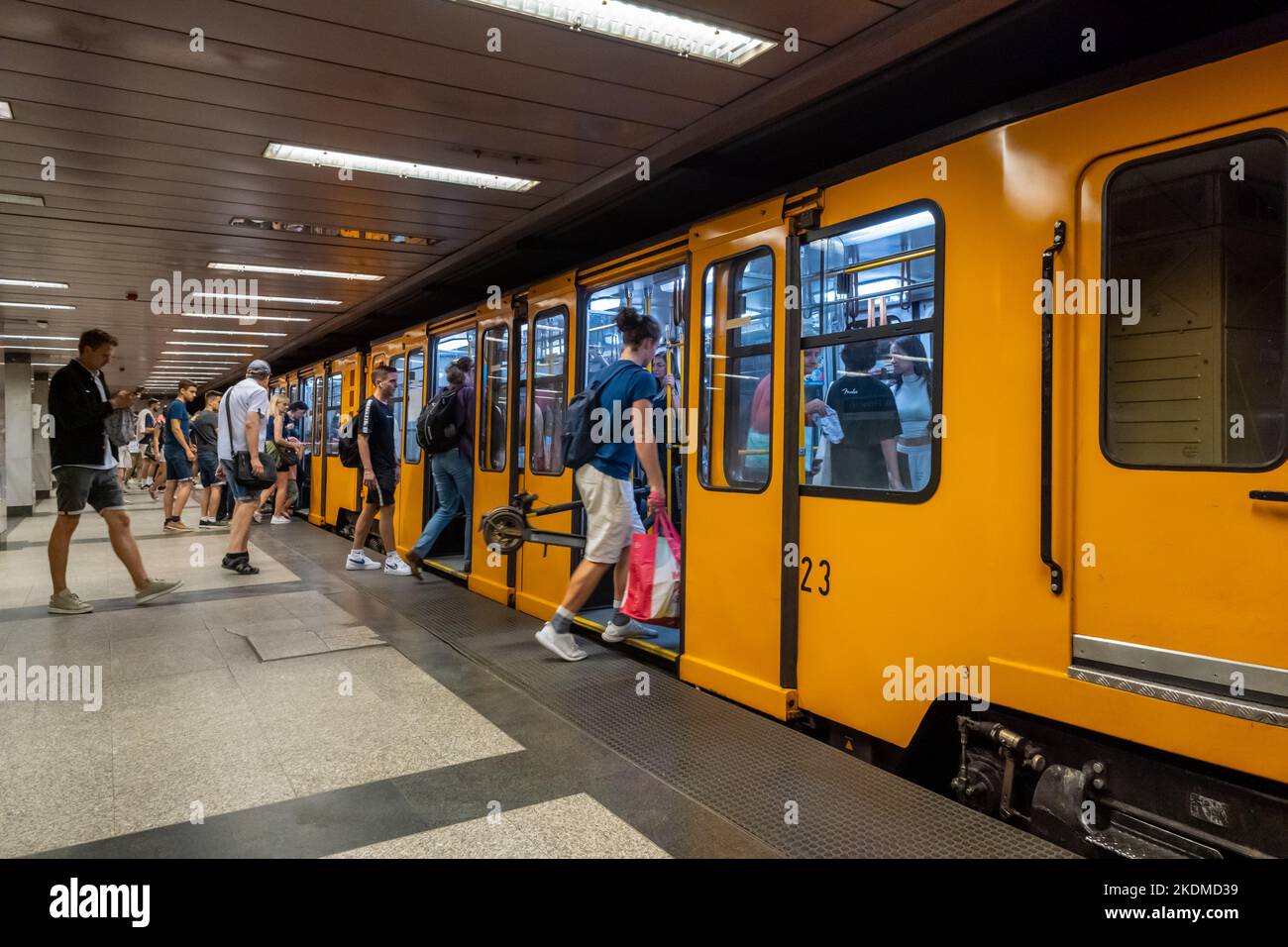 Budapest, Hungary - 3 September 2022: Passengers boarding the yellow ...