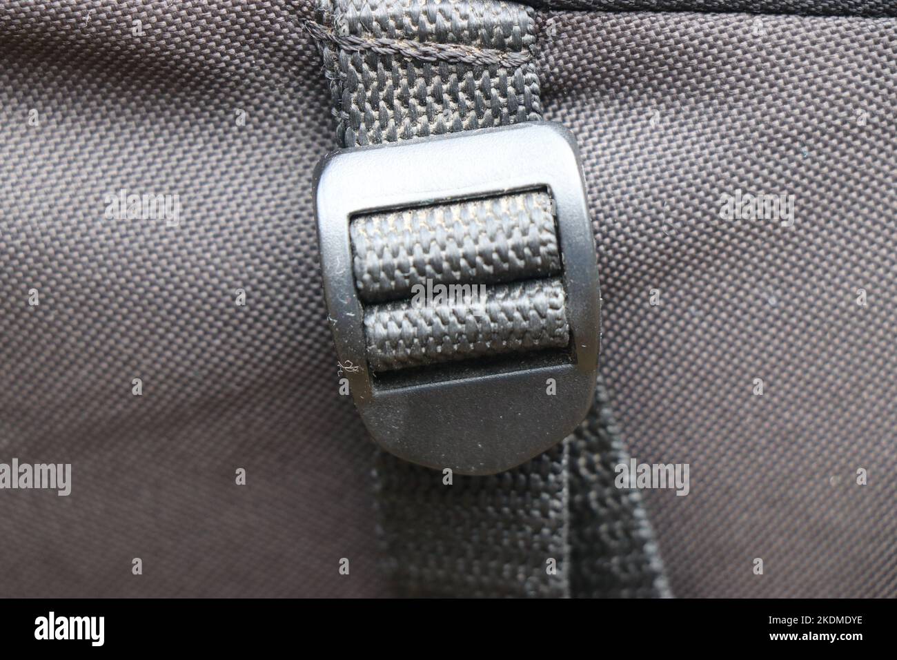 View of strap from the side of a bag that is used to adjust the fittings Stock Photo - Alamy