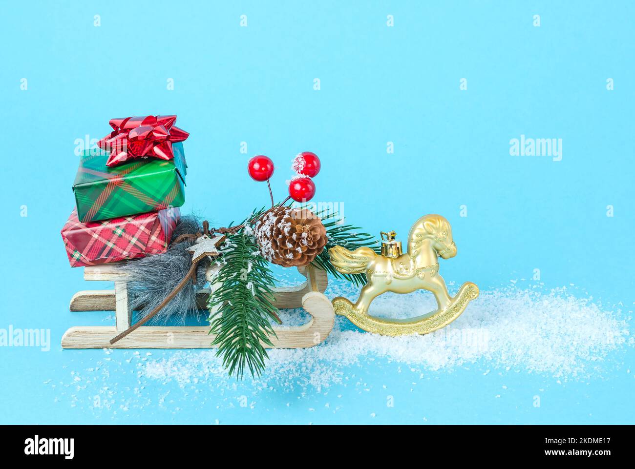 Blue background with sled and horse with christmas and new year gifts ...