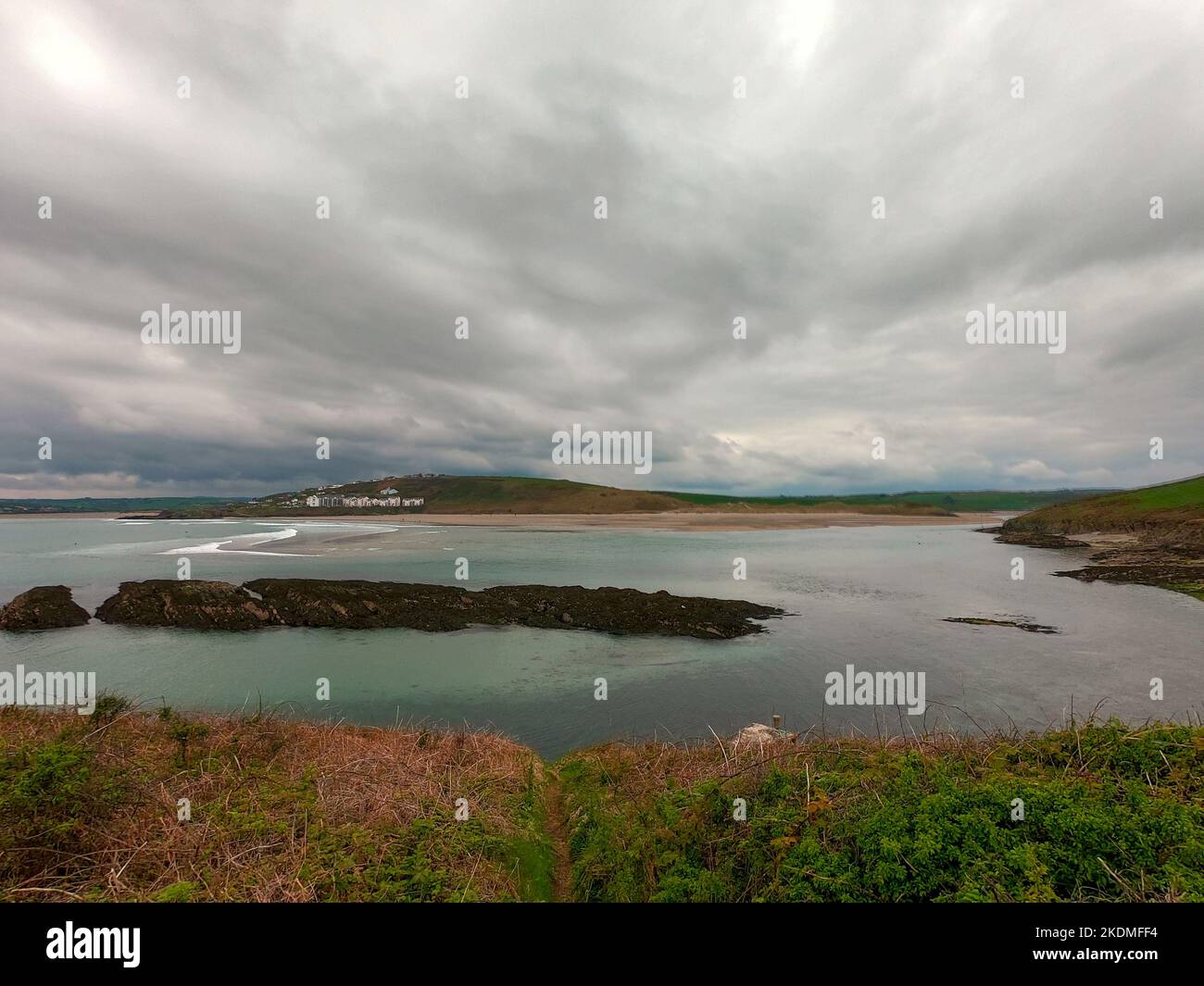 View of Clonakilty Bay on a cloudy day. Gloomy sky over the seashore ...
