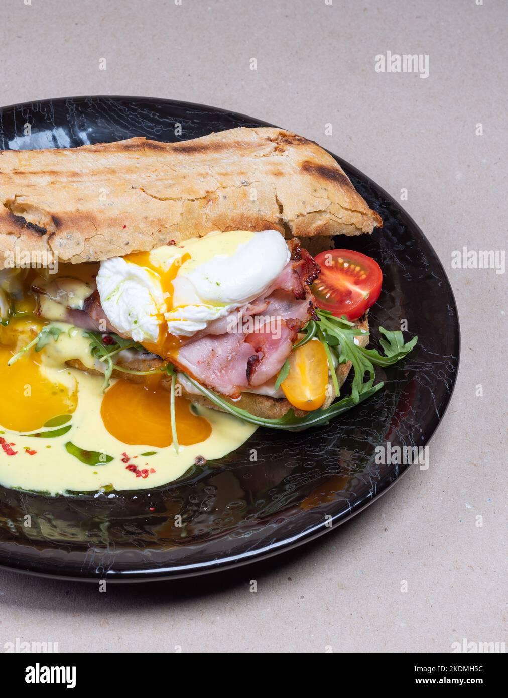 Fried eggs on bacon. Toasted bread. Tasty breakfast Stock Photo - Alamy