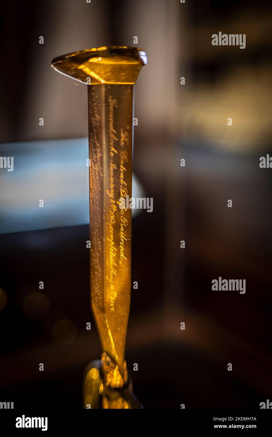 gold spike commissioned by David Hewes to commenorate the connection of ...