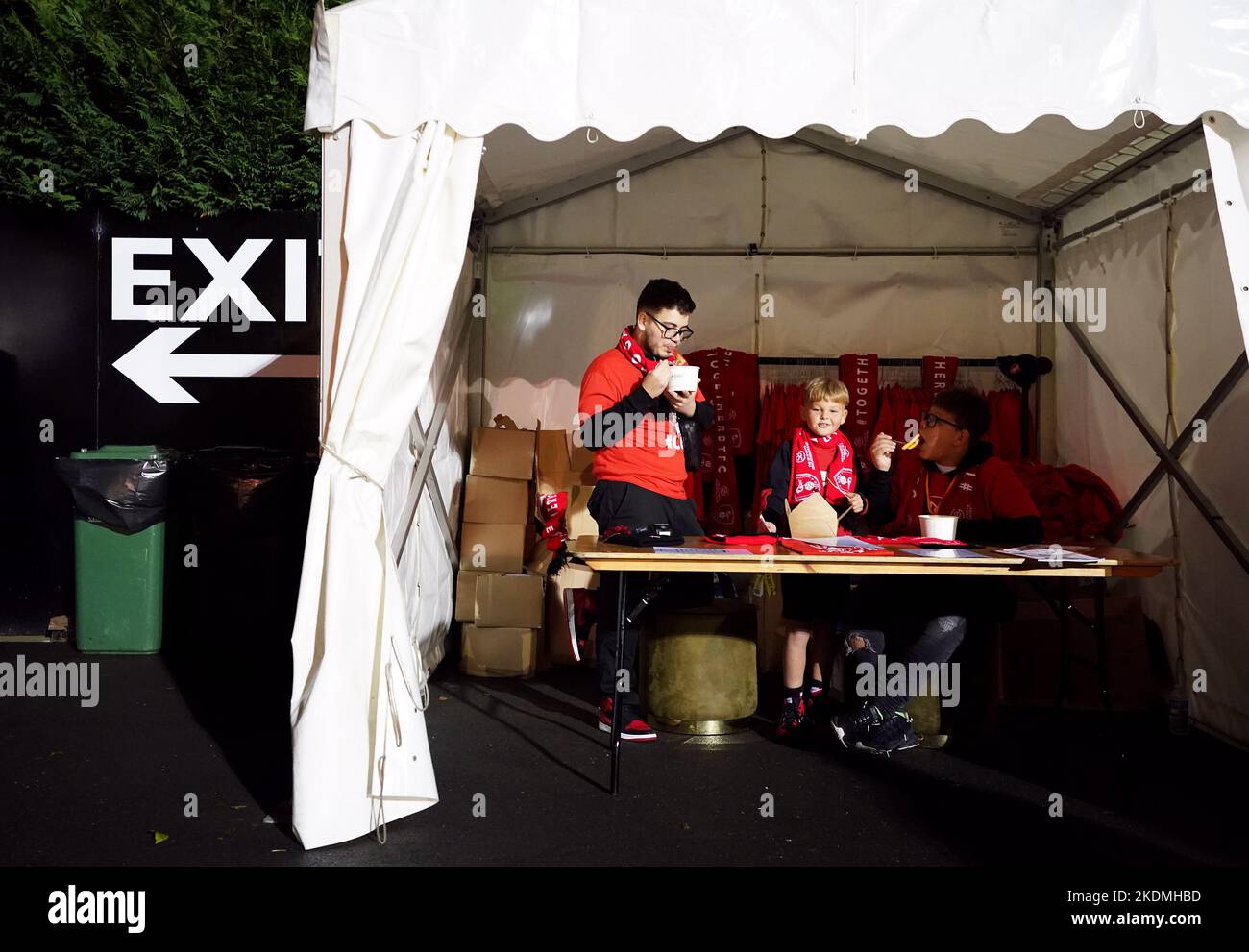 Fans working on a merchandise stall during the Emirates FA Cup first ...