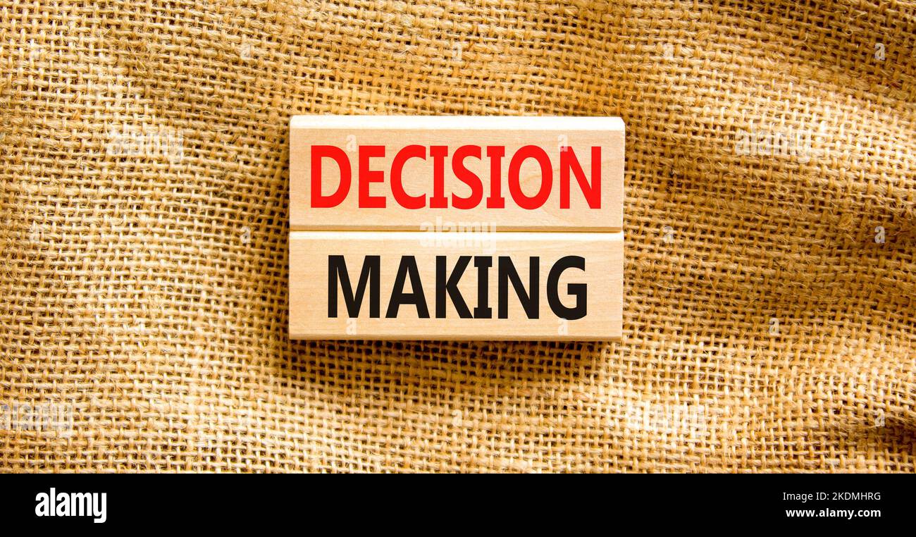 Decision making symbol. Concept words Decision making on wooden blocks ...