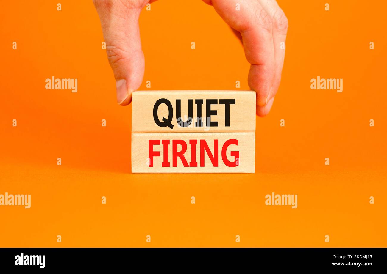 Quiet firing symbol. Concept words Quiet firing on wooden blocks ...
