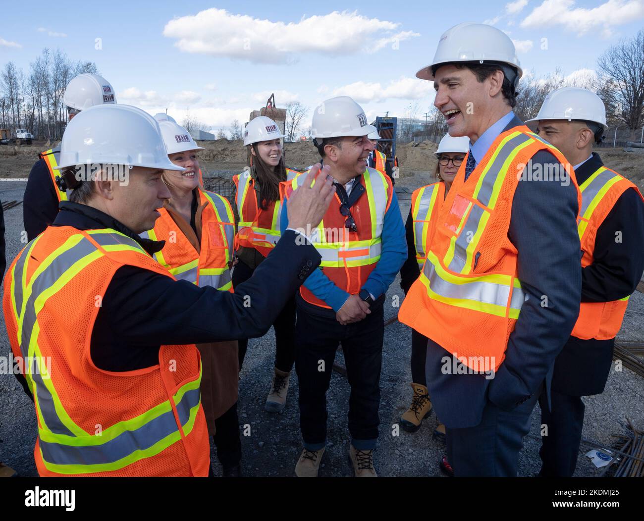 Prime Minister Justin Trudeau chats with workers at the official ...