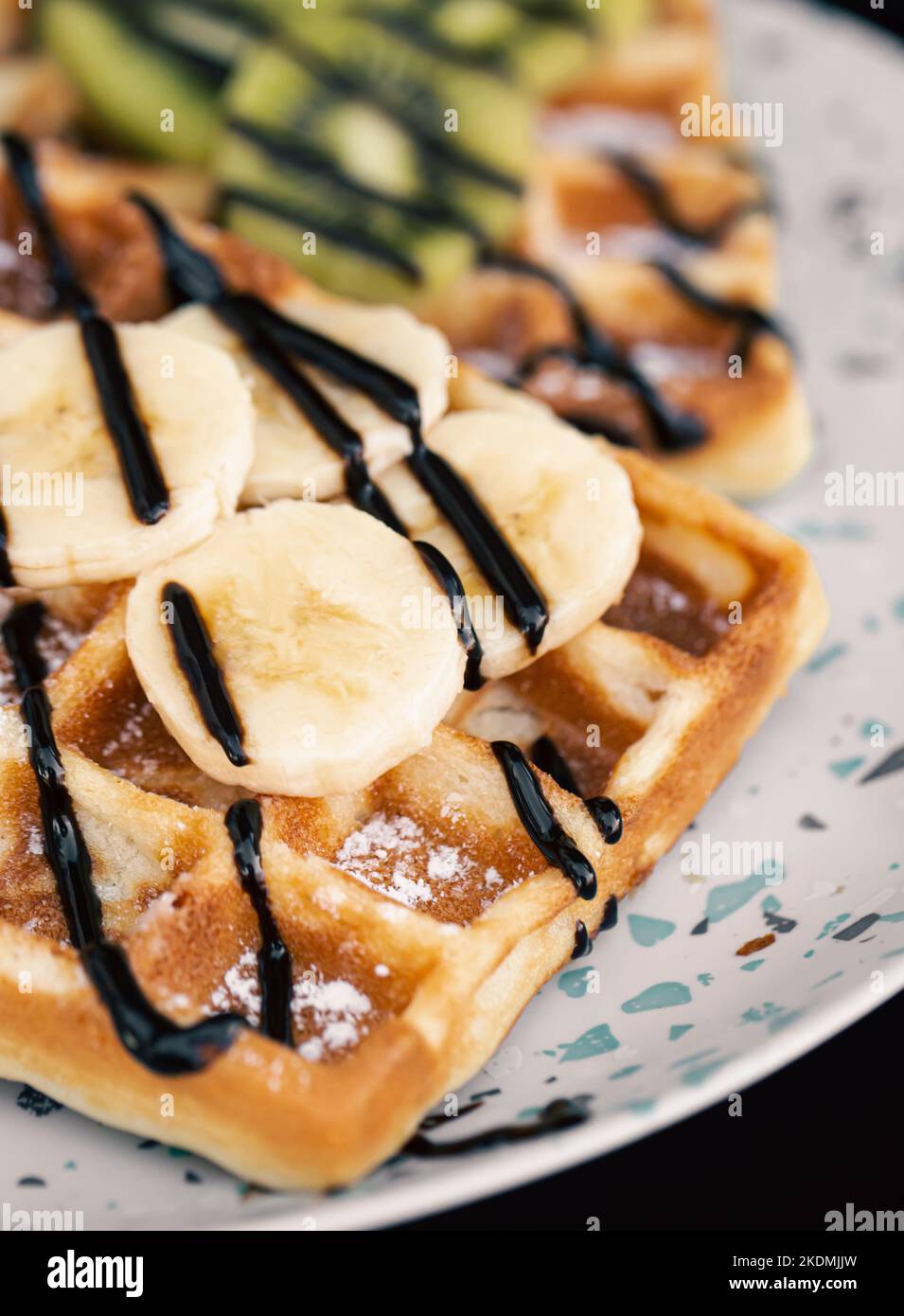 Close-up, Belgian waffles with fruits, covered with chocolate Stock ...