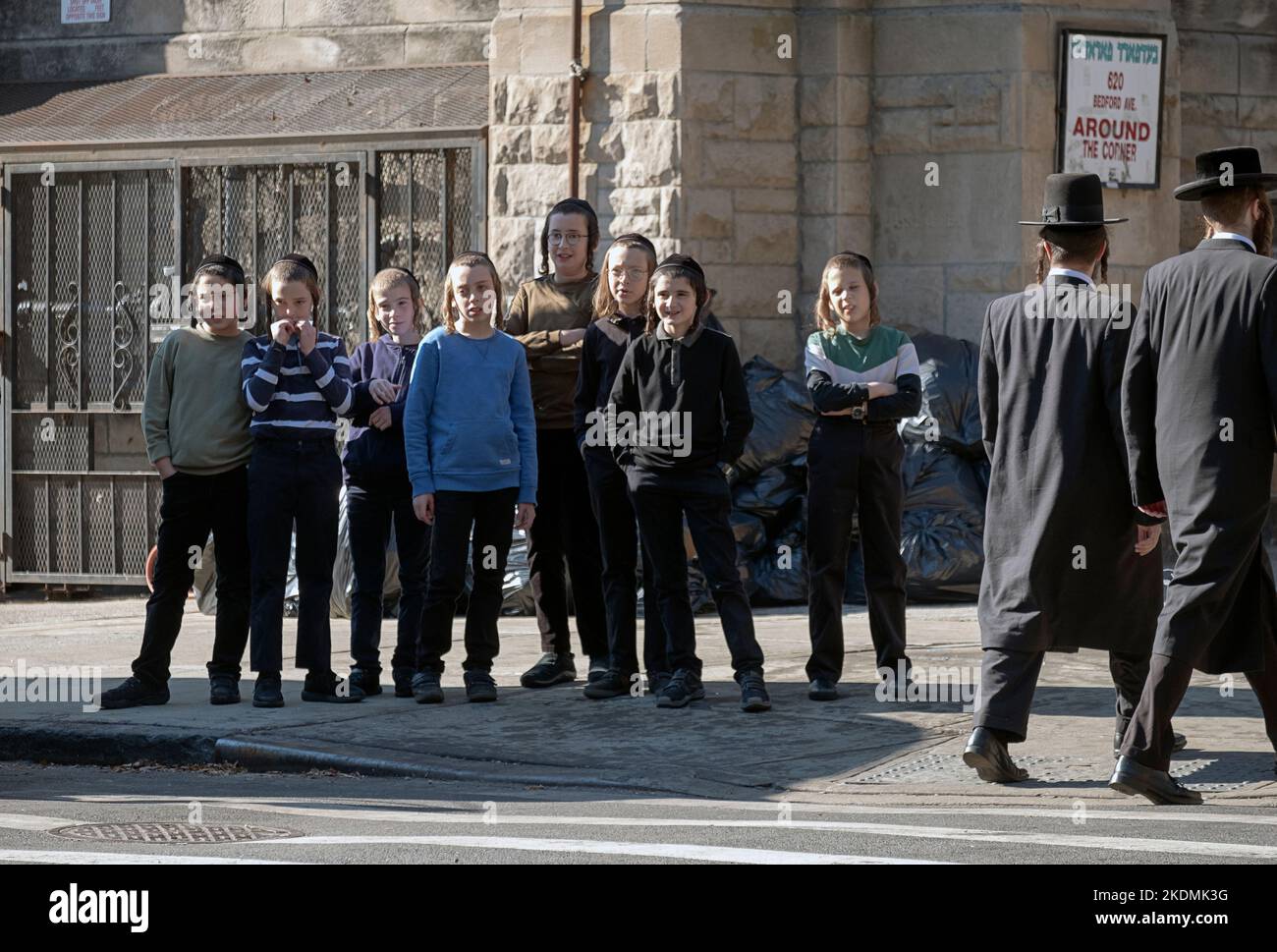 During yeshiva recess, 8 orthodox Jewish boys, each with long peyot ...