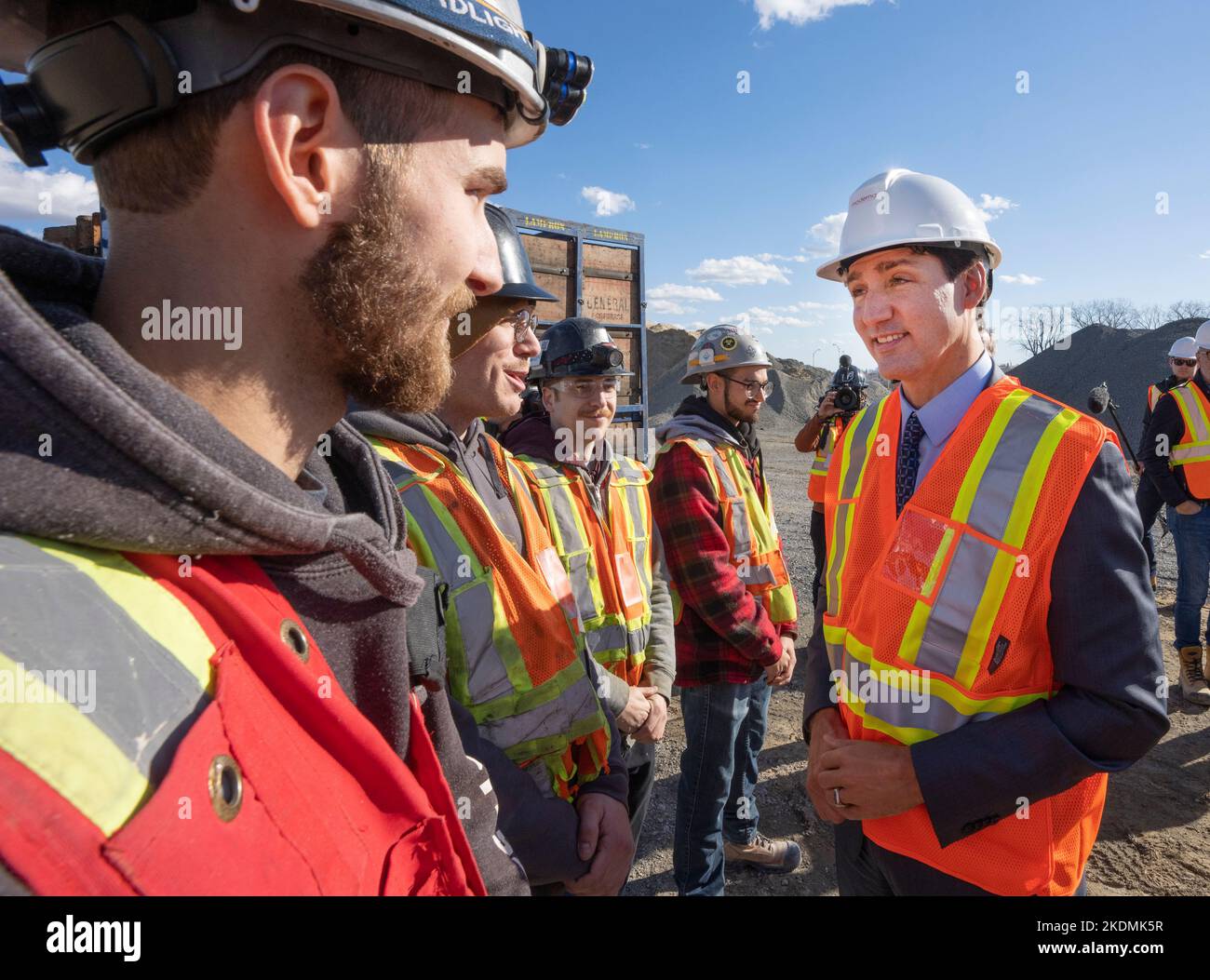Prime Minister Justin Trudeau chats with workers at the official ...