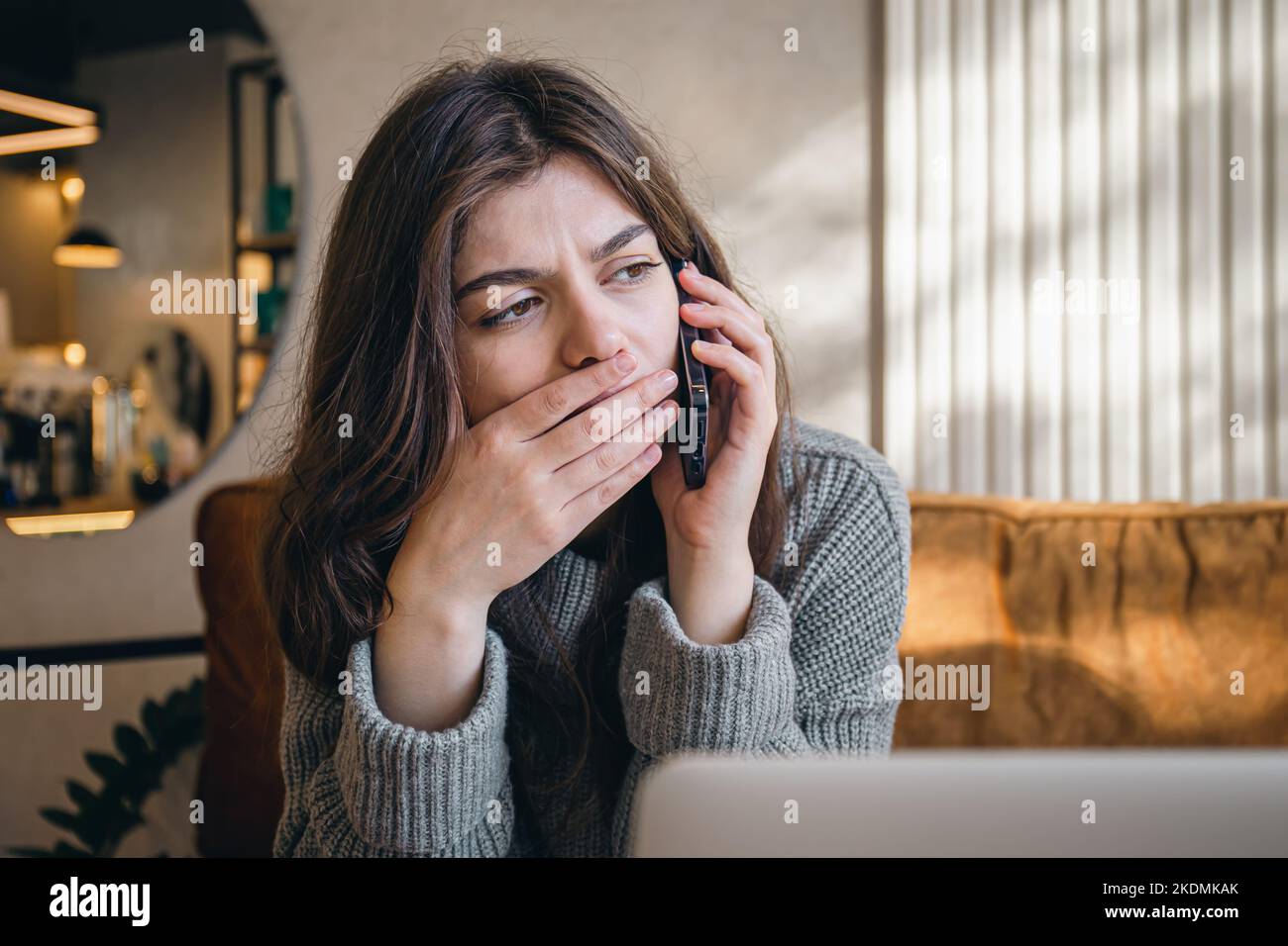 Sad female designer sitting on hi-res stock photography and images - Alamy