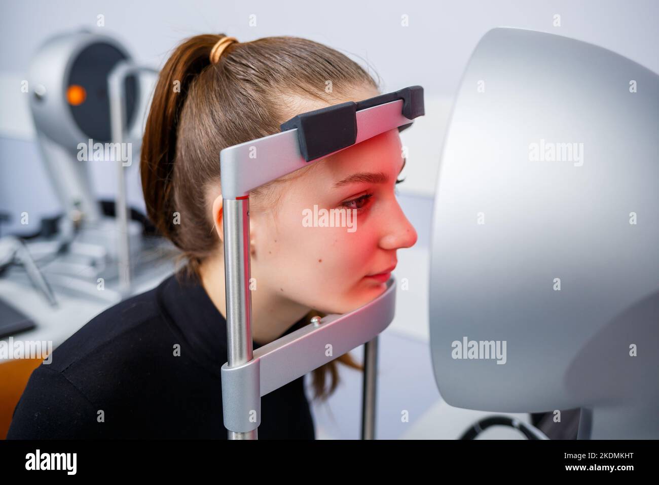 An optometrist at his clinic studies vision. Ophthalmology, medical ...