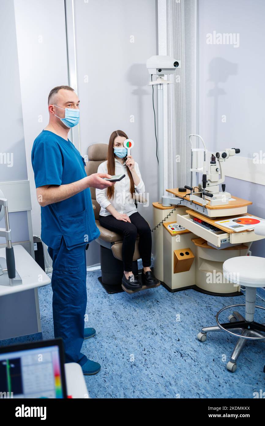 Ophthalmologist consultation in a modern new hospital. A modern doctor ...
