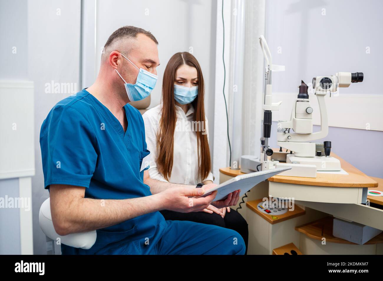 Ophthalmologist consultation in a modern new hospital. A modern doctor ...