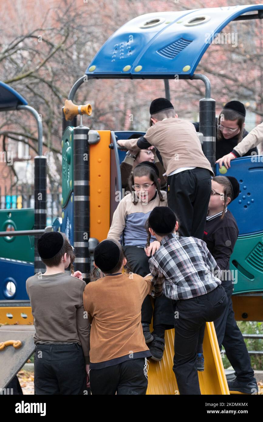 Yeshiva students enjoy their recess in a park across the street from ...