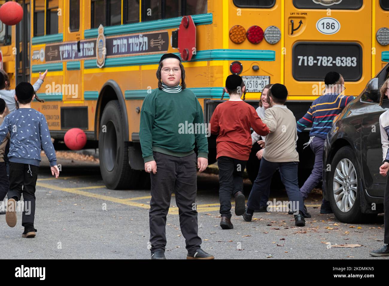 Orthodox jewish boys play during recess outside the Vizhnitz yeshiva in ...