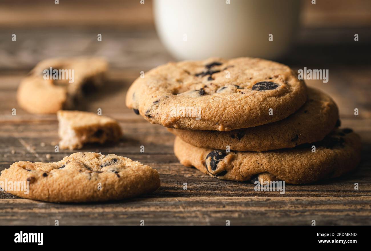 Chocolate chip cookies close up on a wooden background Stock Photo - Alamy
