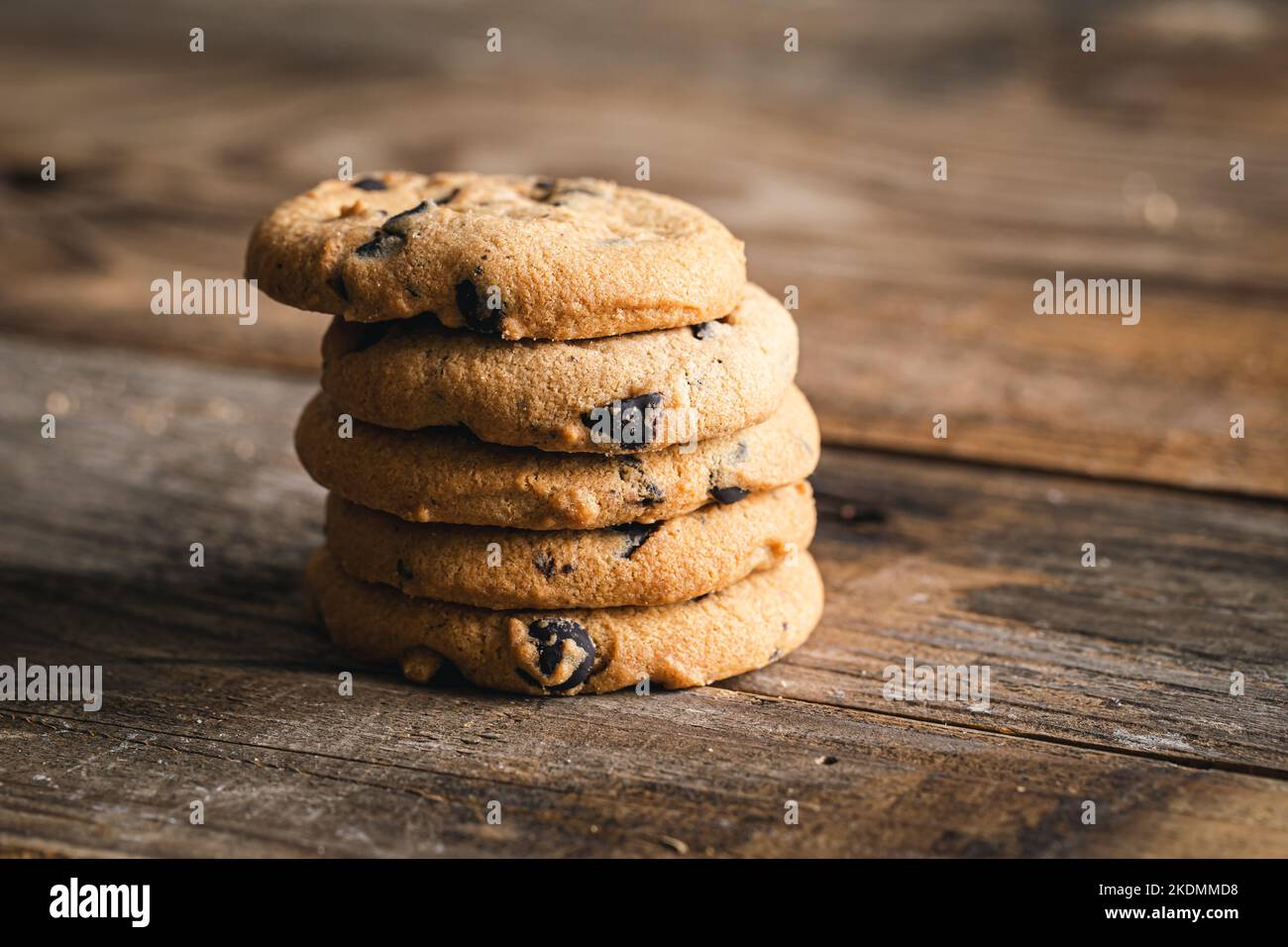 Chocolate chip cookies close up on a wooden background Stock Photo - Alamy