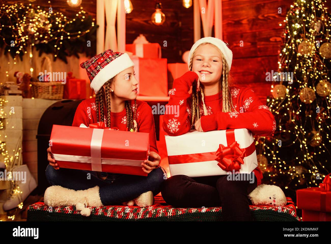 Jingle bells. family holiday. New Year party. children in red santa hat ...