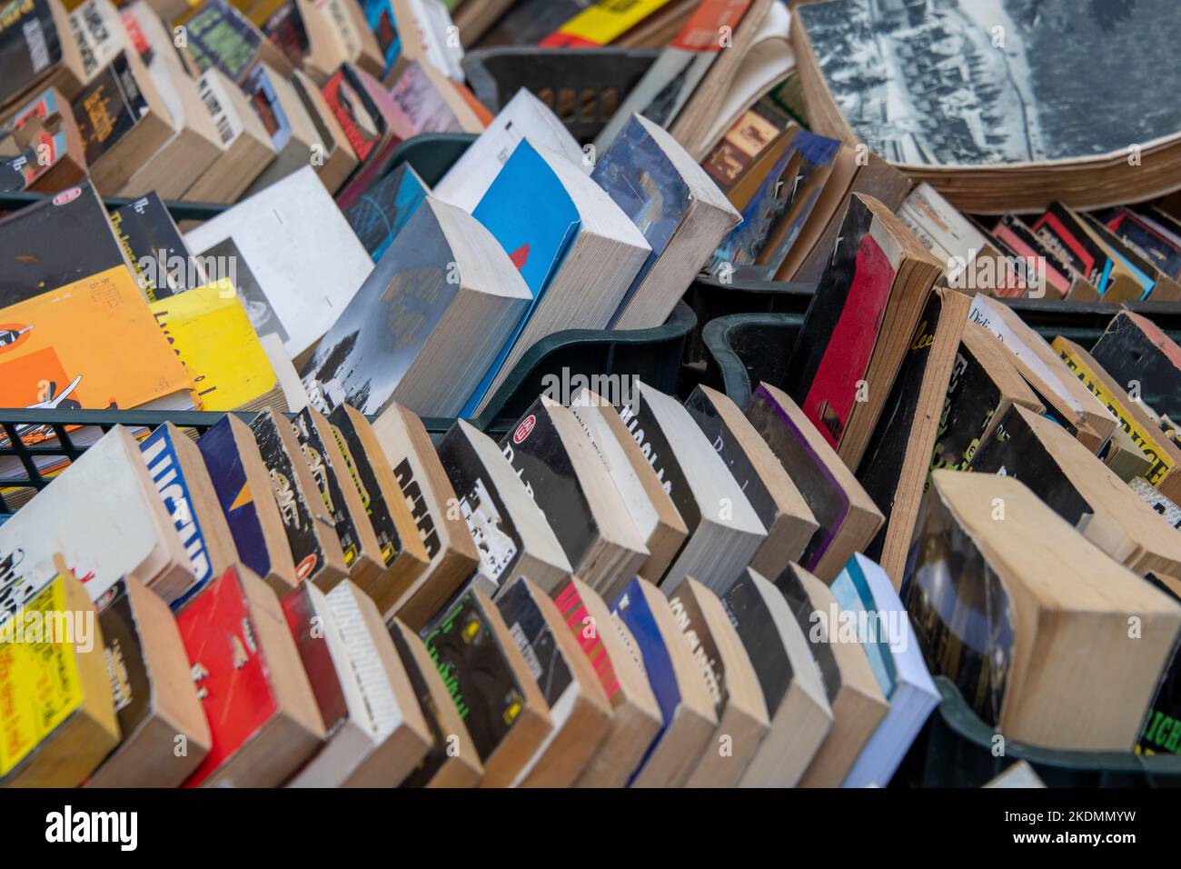 Many different used books to sell at the flea market Stock Photo - Alamy