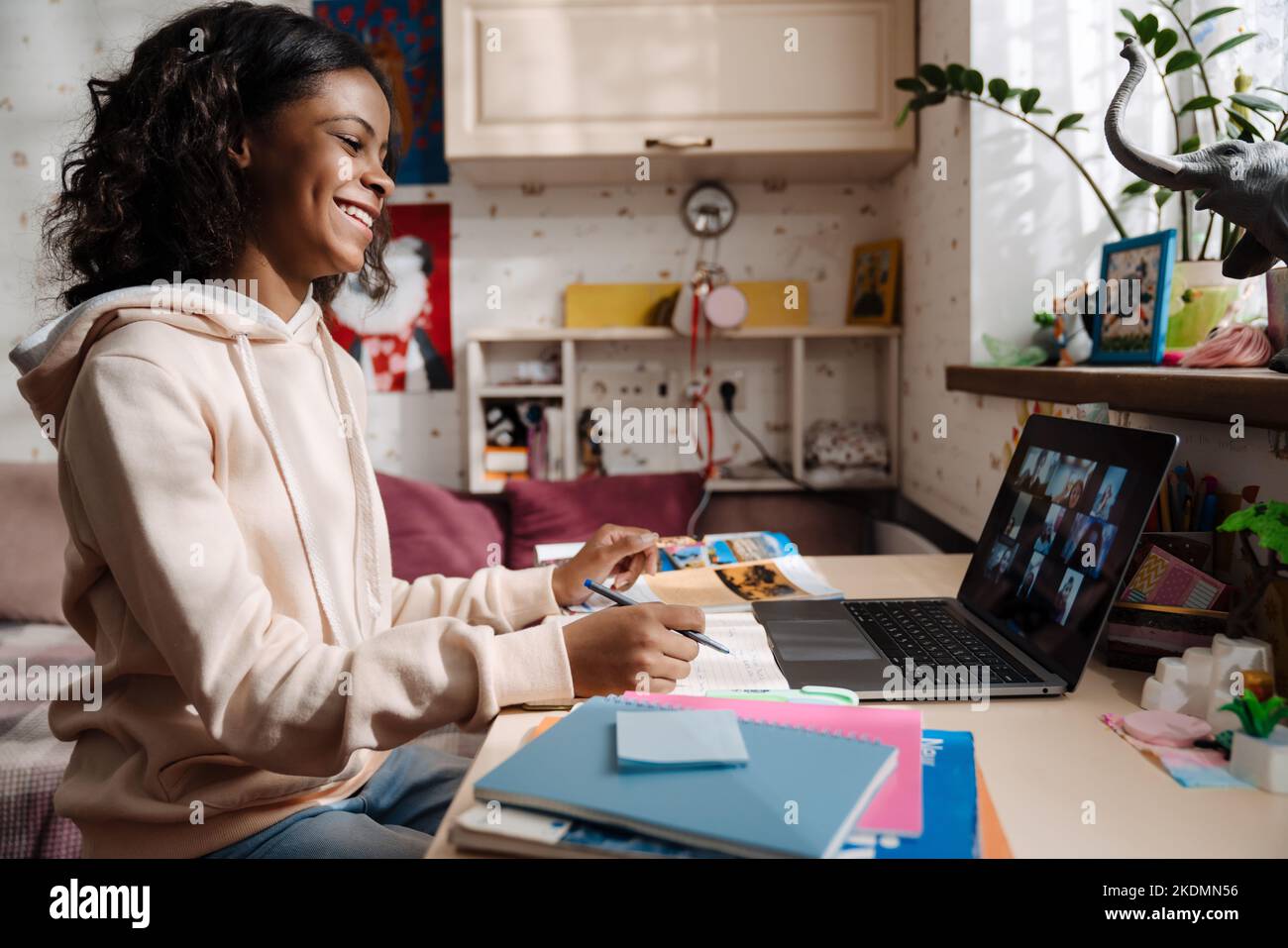 African teen girl on distance learning during video conference with ...