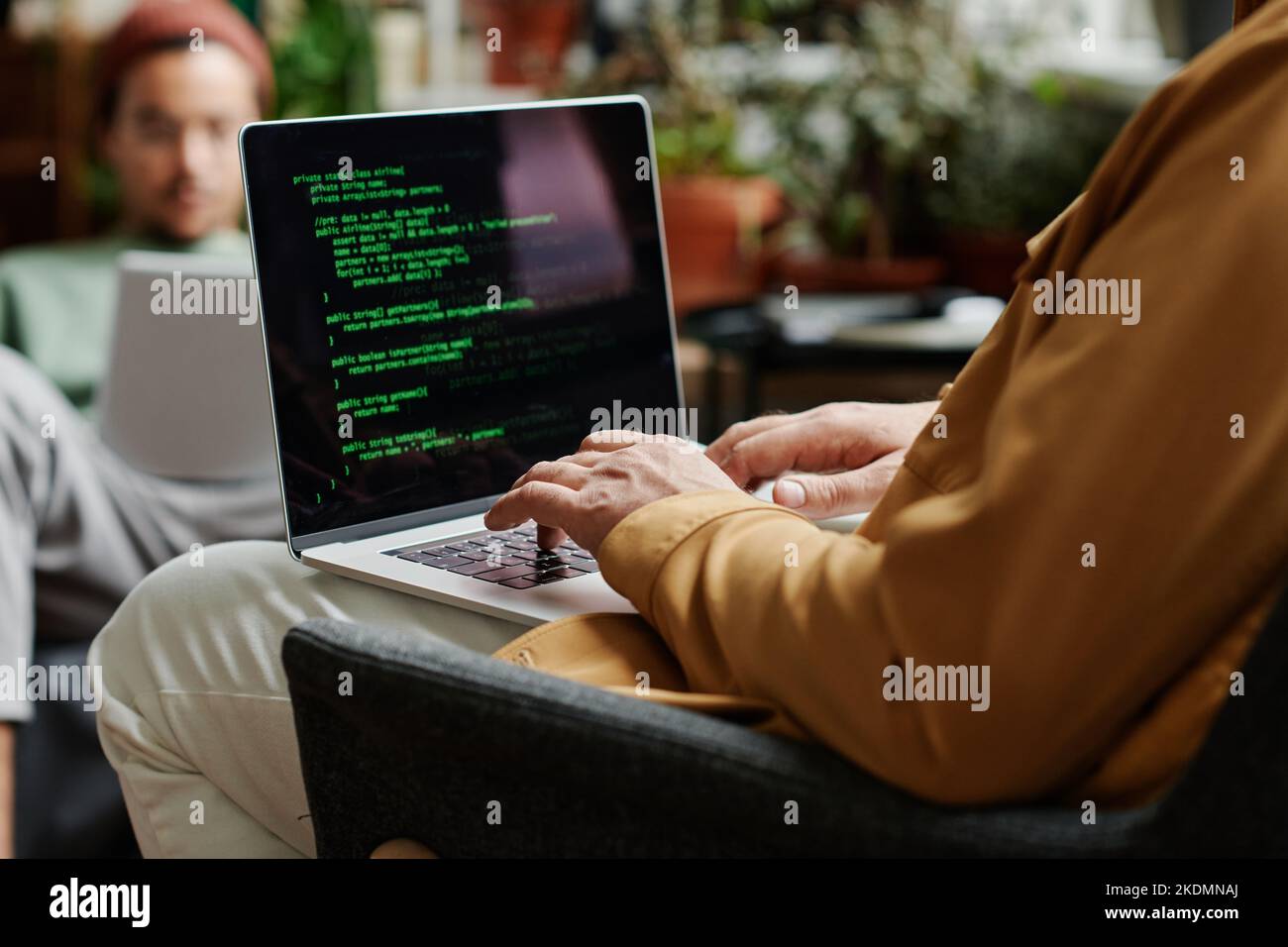 Mature Professional It Engineer Developing New Software Or Decoding Data On Laptop Scren While 