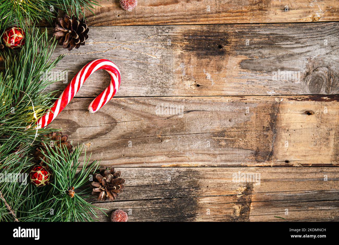 Christmas wooden background with fir branches and cones, flat lay Stock ...