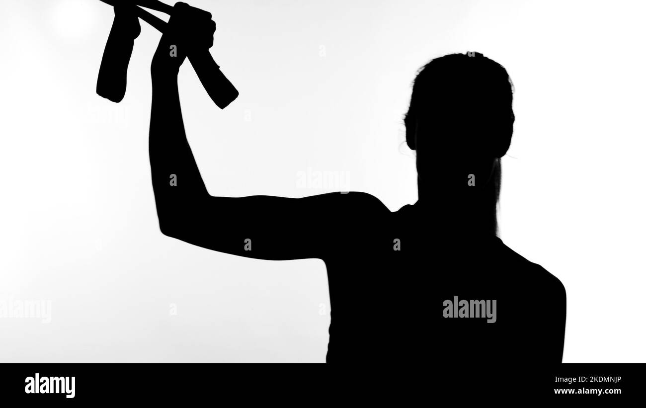 on a white background, a shadow, a black outline of a female figure ...