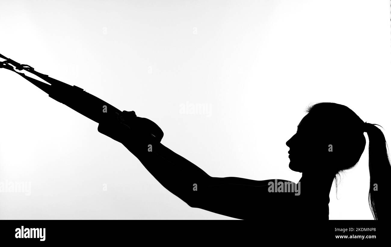 on a white background, a shadow, a black outline of a female figure ...