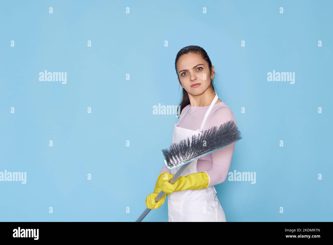 Professional cleaner woman in apron hi-res stock photography and images ...