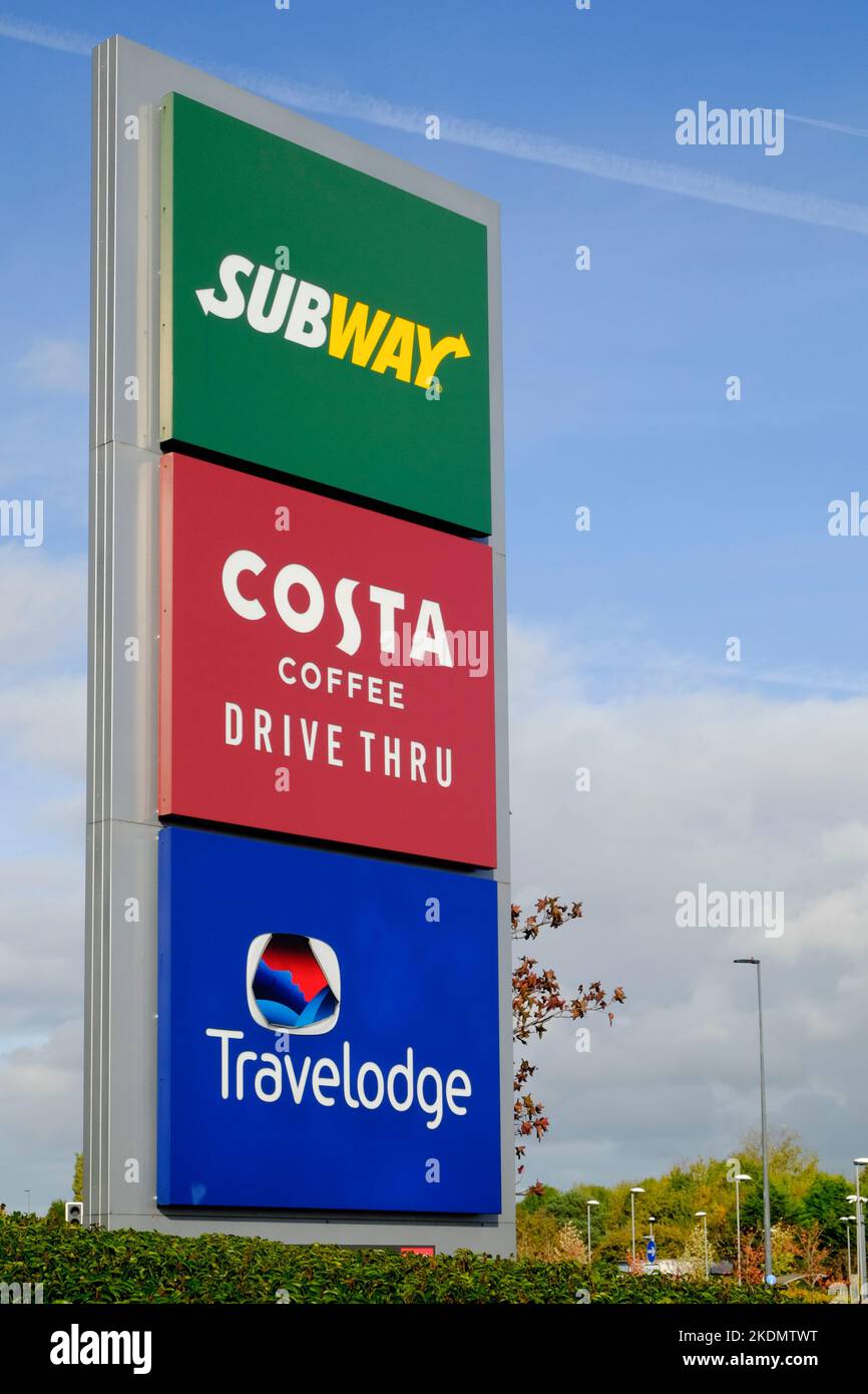 Roadside signs for Subway,Costa drive thru and Travelodge on the A38 on ...