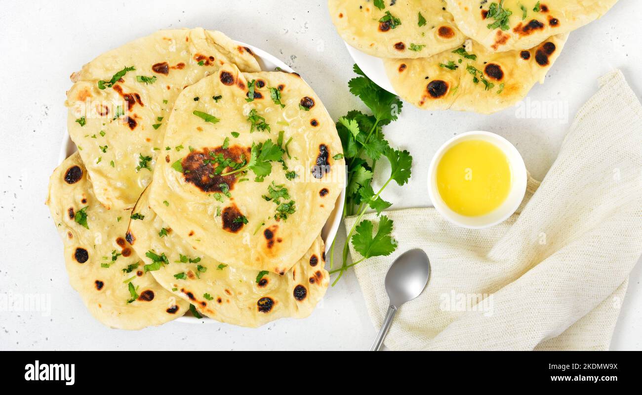Indian naan bread over light background. Top view, flat lay Stock Photo ...