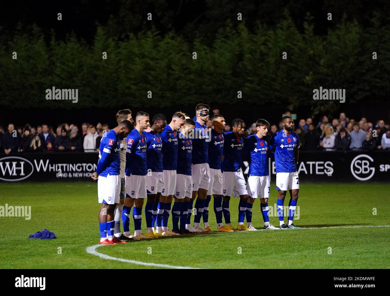 Ipswich Town players line up for a minutes silence ahead of Remembrance ...