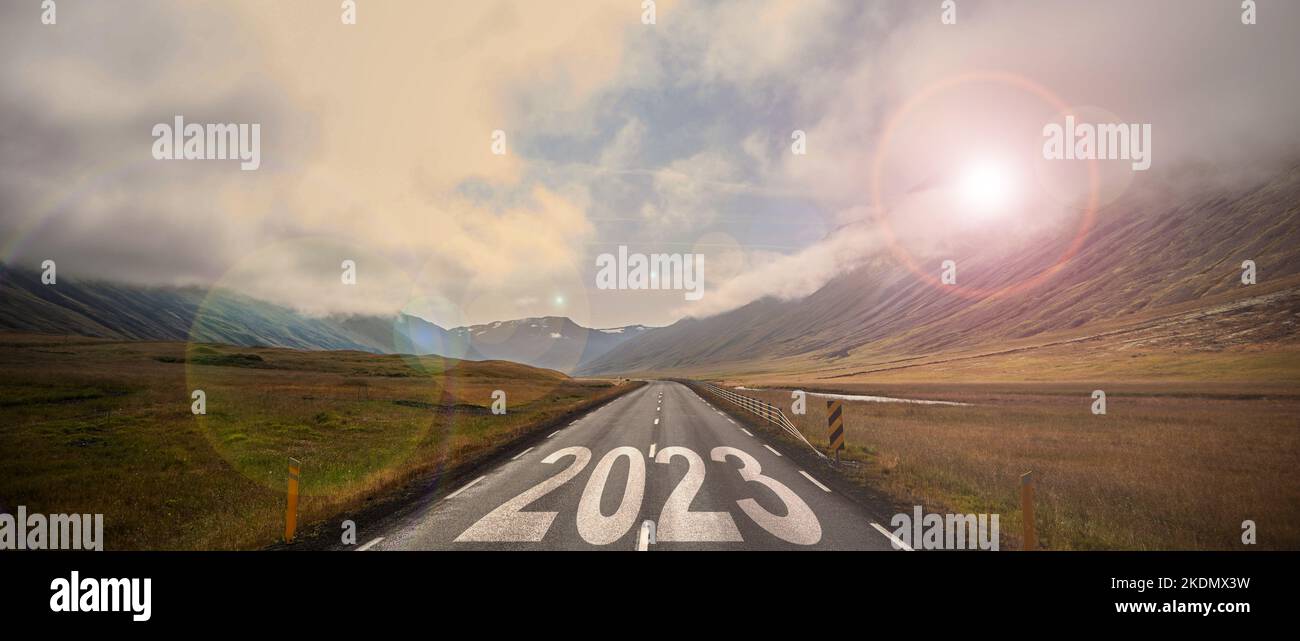 The word 2023 written on highway road in the middle of empty asphalt ... The word 2023 written on highway road in the middle of empty asphalt ...