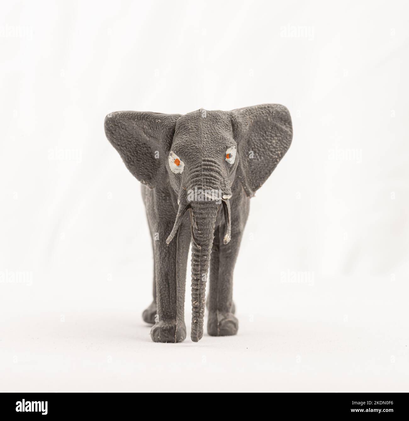 Plastic toy elephant on white background Stock Photo - Alamy
