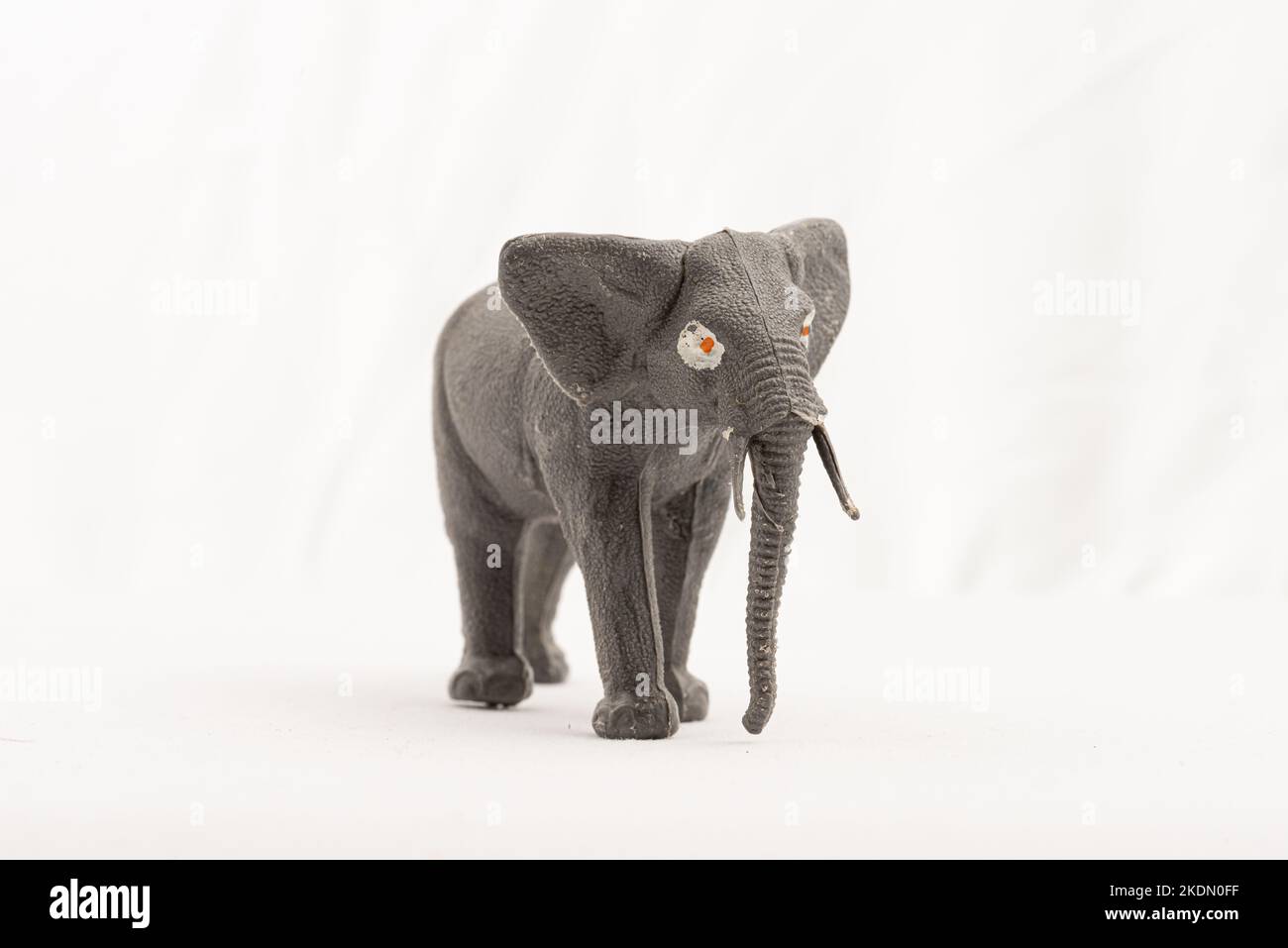 Plastic toy elephant on white background Stock Photo - Alamy