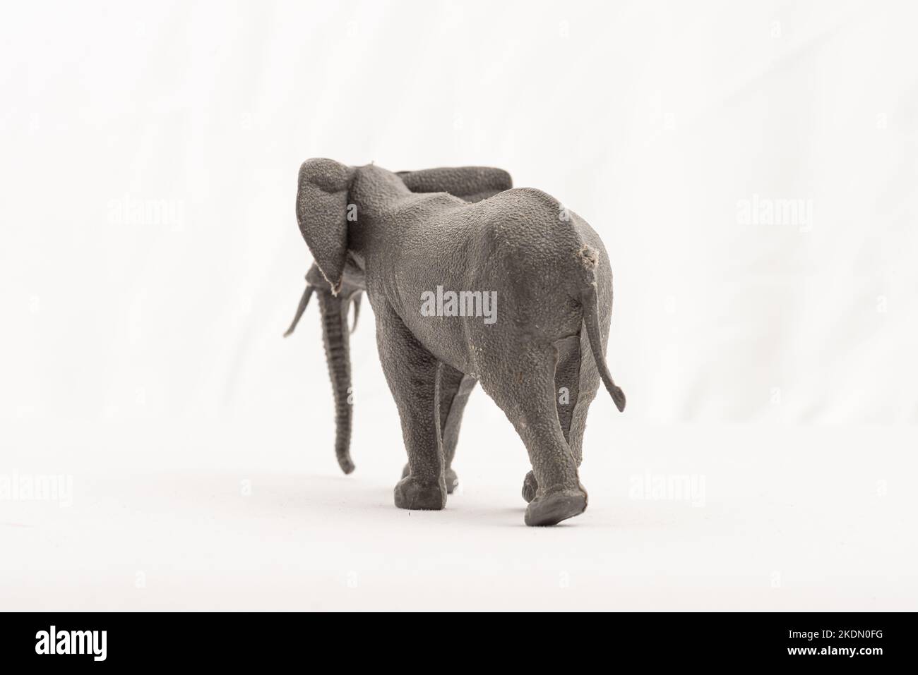 Plastic toy elephant on white background Stock Photo - Alamy