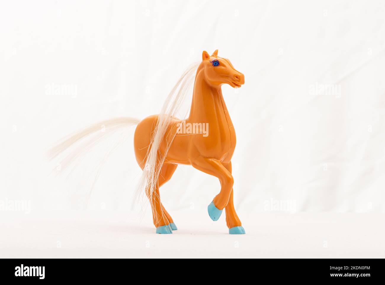 Plastic toy horse on white background Stock Photo - Alamy