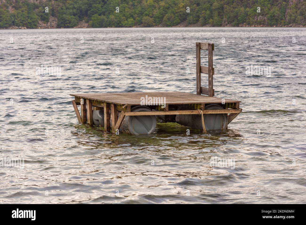 Small wooden bathing raft near a beach Stock Photo - Alamy