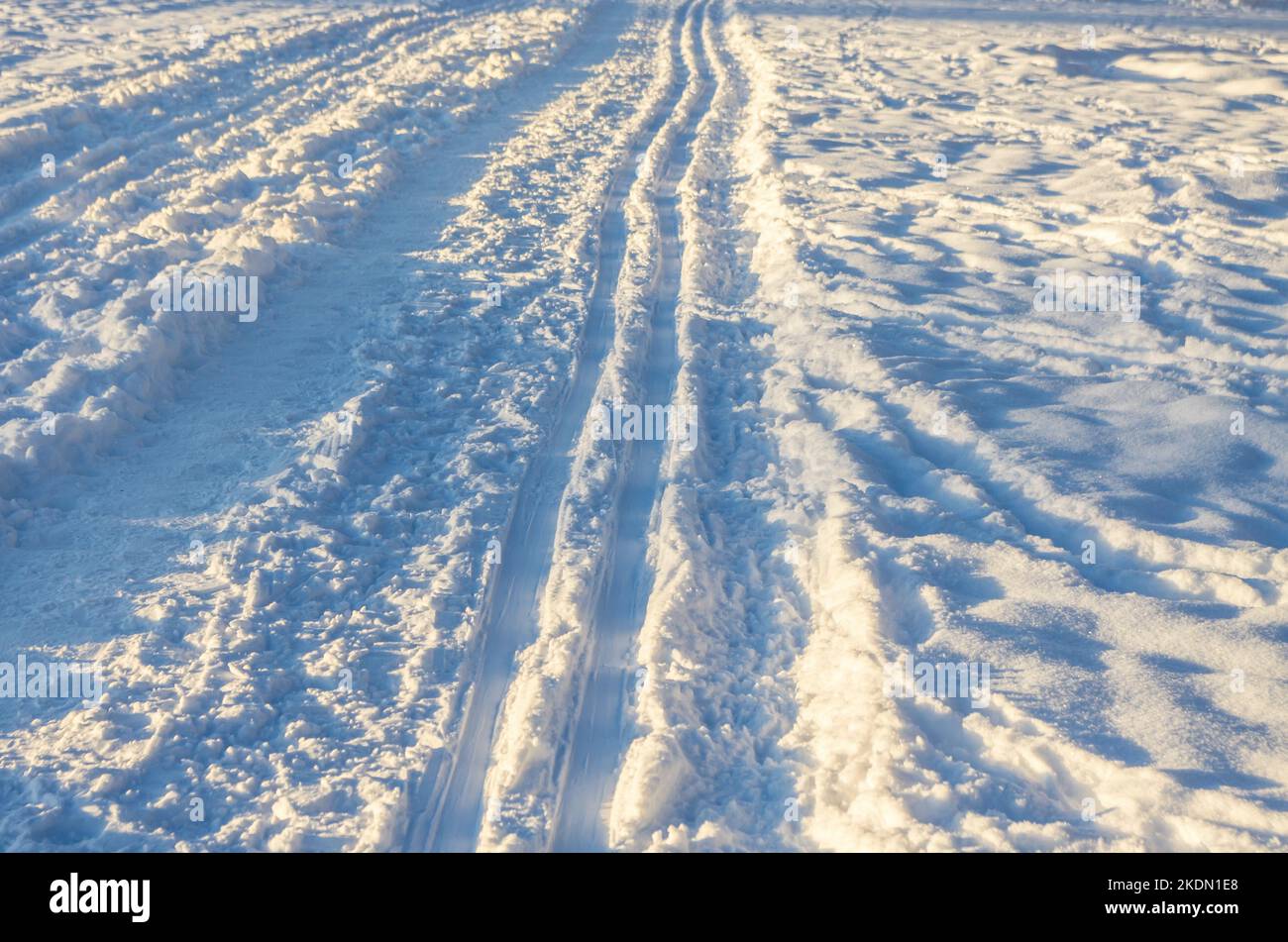 Tracks of skiing in the snow for winter sporting on a frozen lake Stock ...