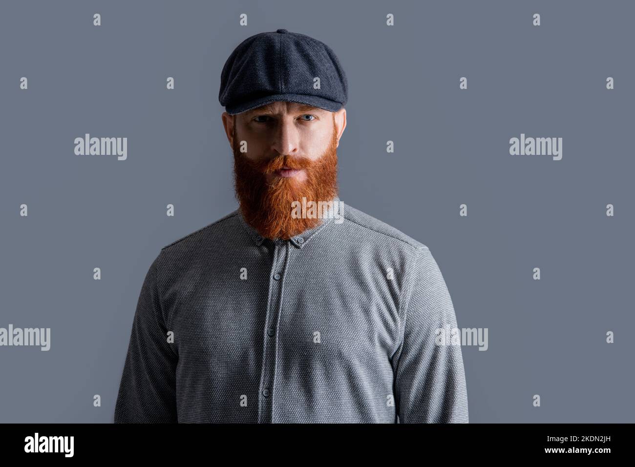 Irish guy studio. Bearded guy isolated on grey. Unshaven guy with beard ...