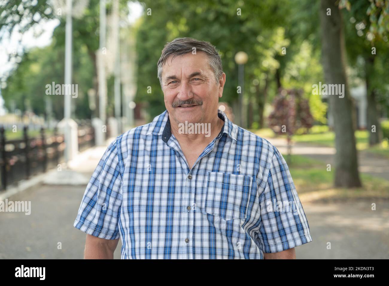 Portrait of a very old man 70 years old. Grandpa is resting in the ...