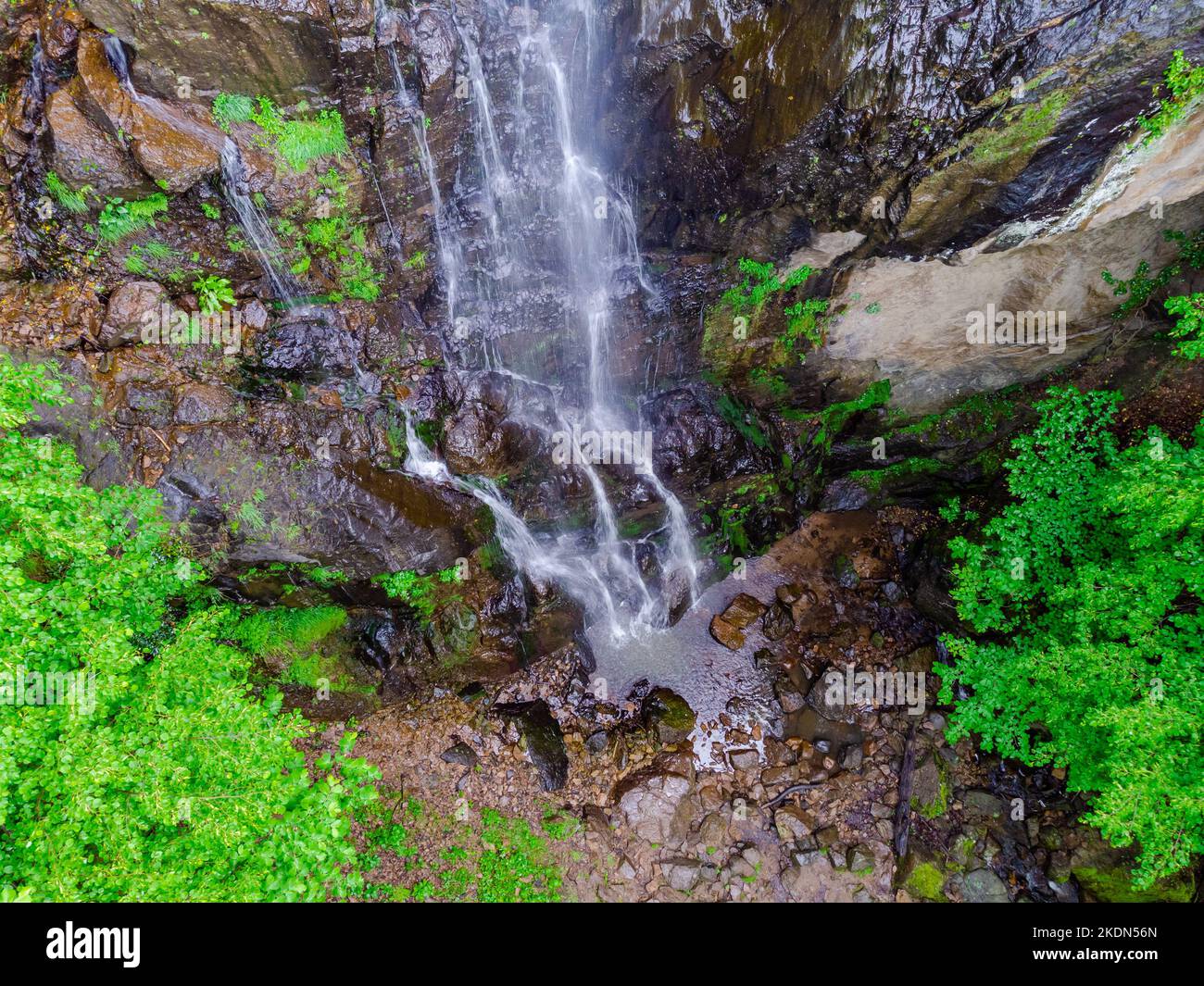 waterfall in deep mountain with large rocks Stock Photo - Alamy