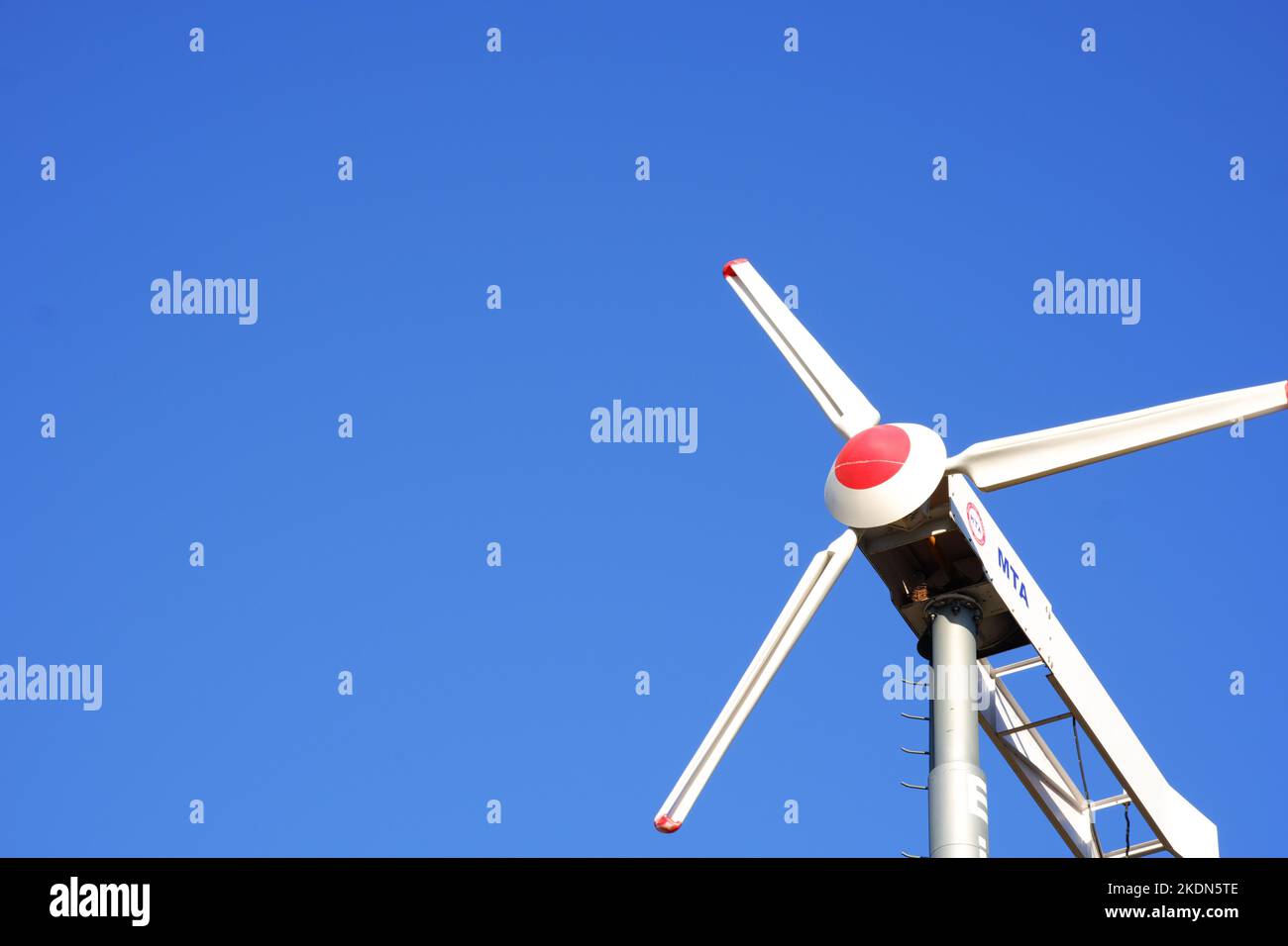 Wind turbine to produce electricity with clear sky at the background ...