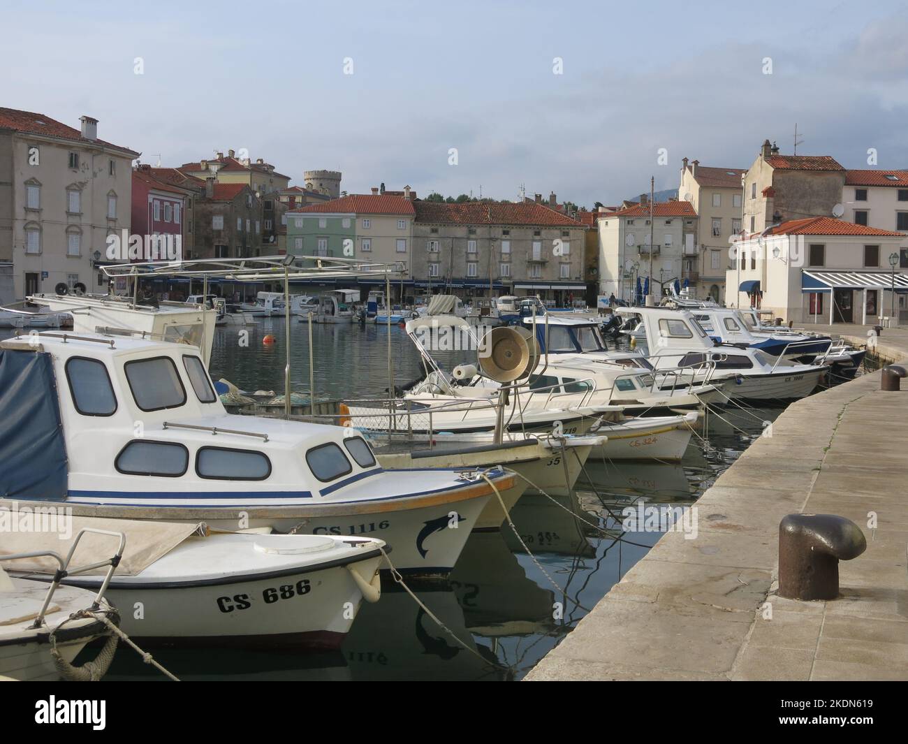 The pretty town of Cres with its colourful buildings and marina is a ...