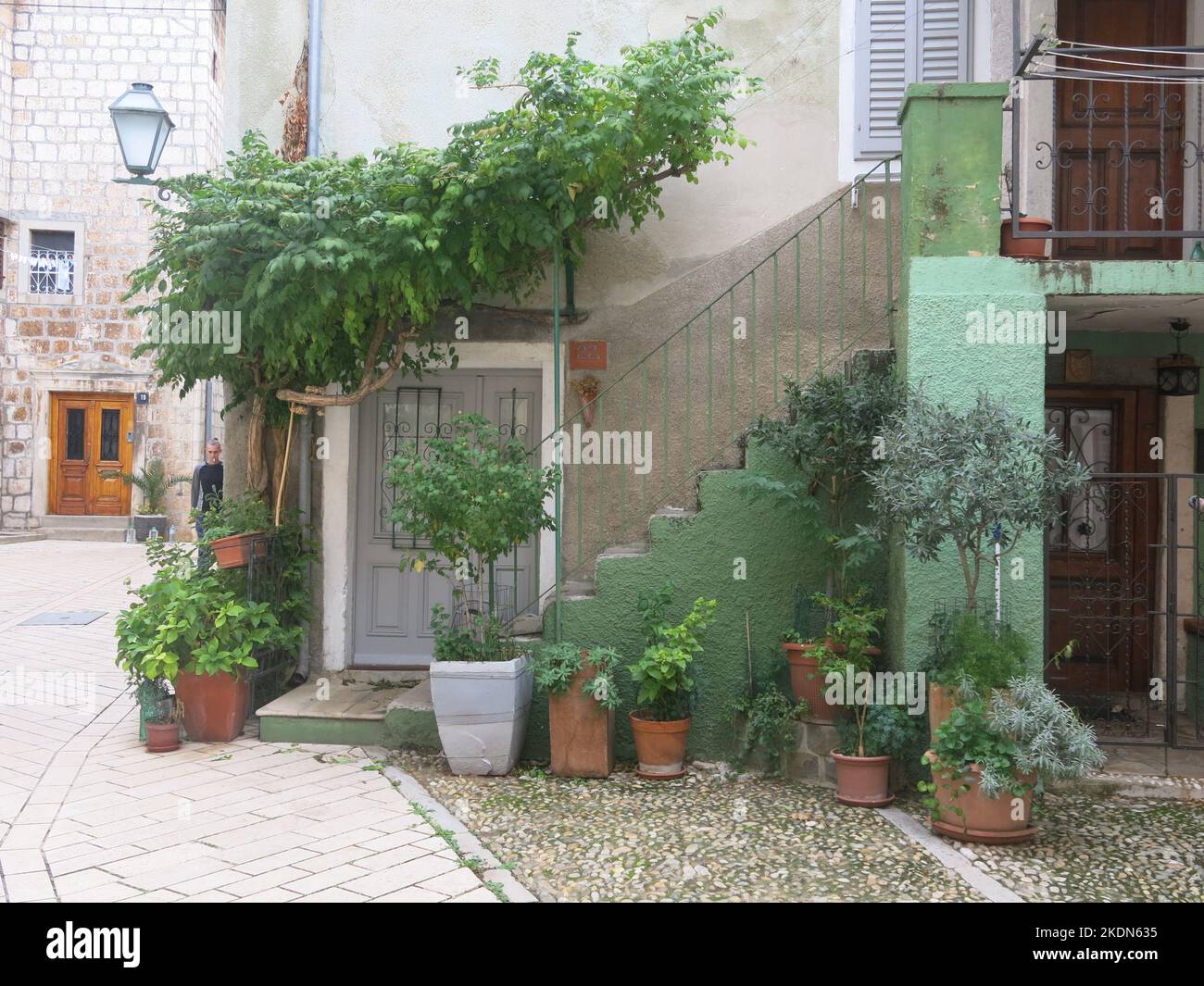 In the medieval maze of old town Cres, the narrow streets open out into ...