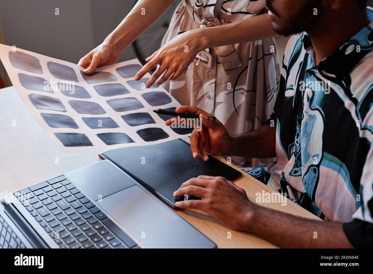 Close up of creative team choosing color palette for design project in ...
