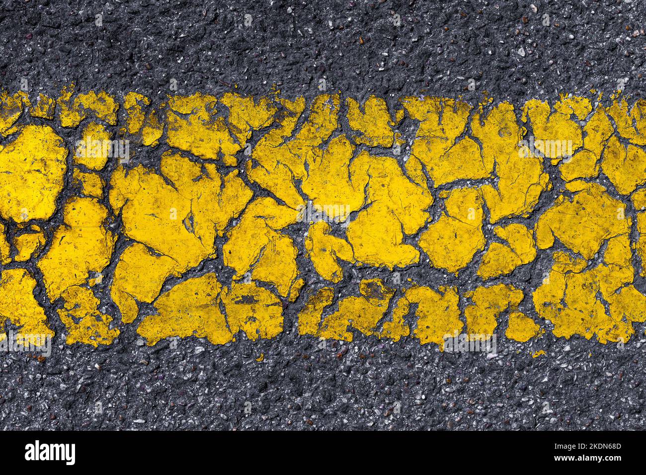Old damaged yellow road marking line as background Stock Photo - Alamy