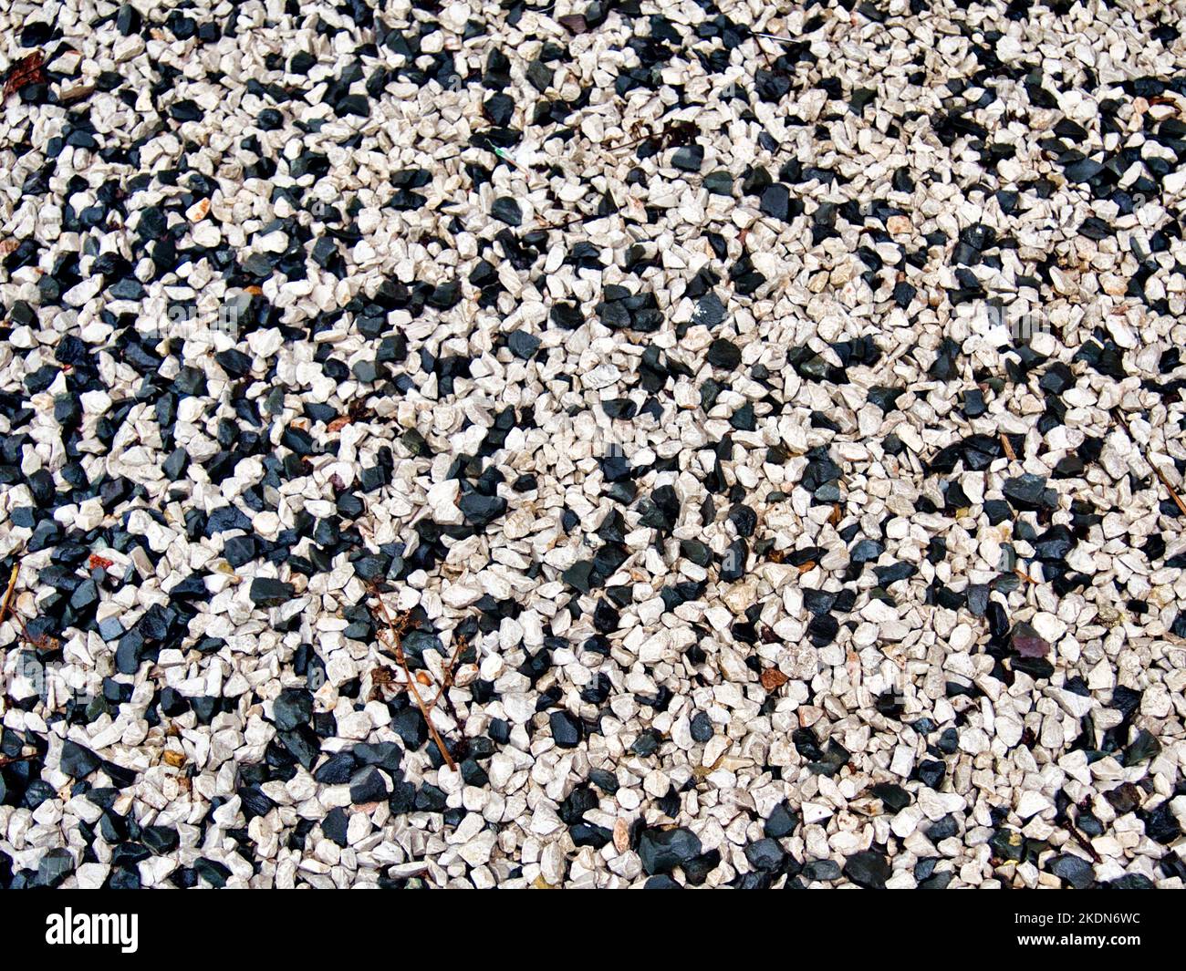 stones thrown in the field Stock Photo - Alamy